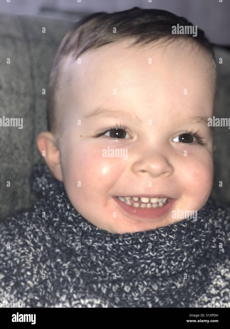 Smiley toddler hi-res stock photography and images - Alamy