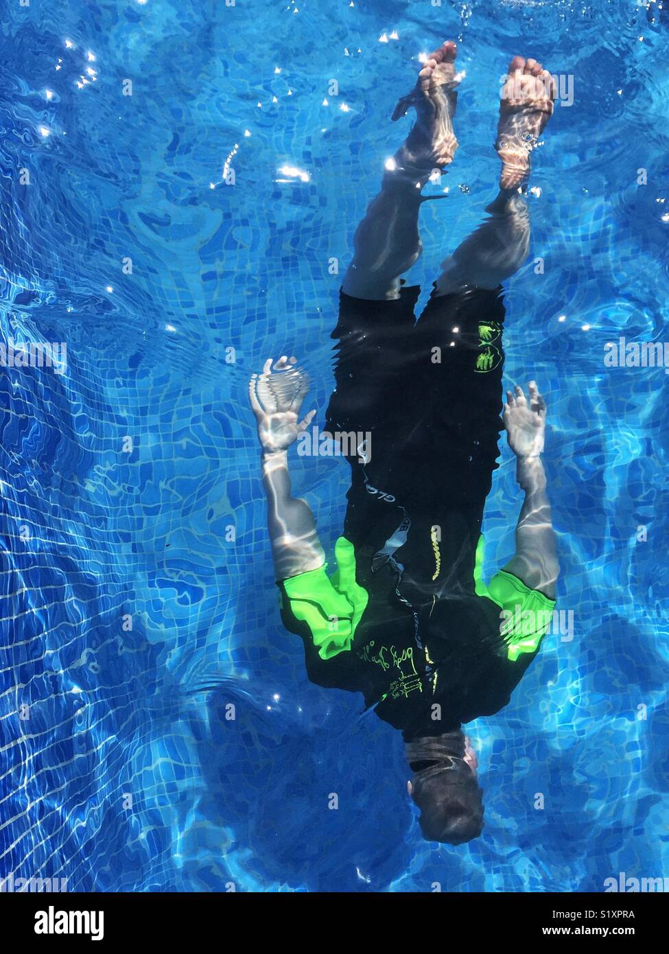 Boy floats High Resolution Stock Photography and Images - Alamy