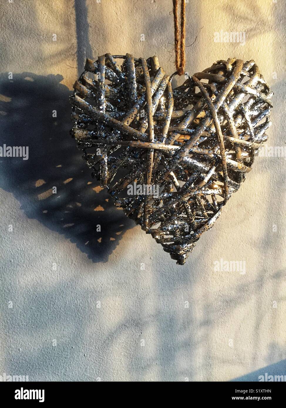 Heart wall hanging hi-res stock photography and images - Alamy