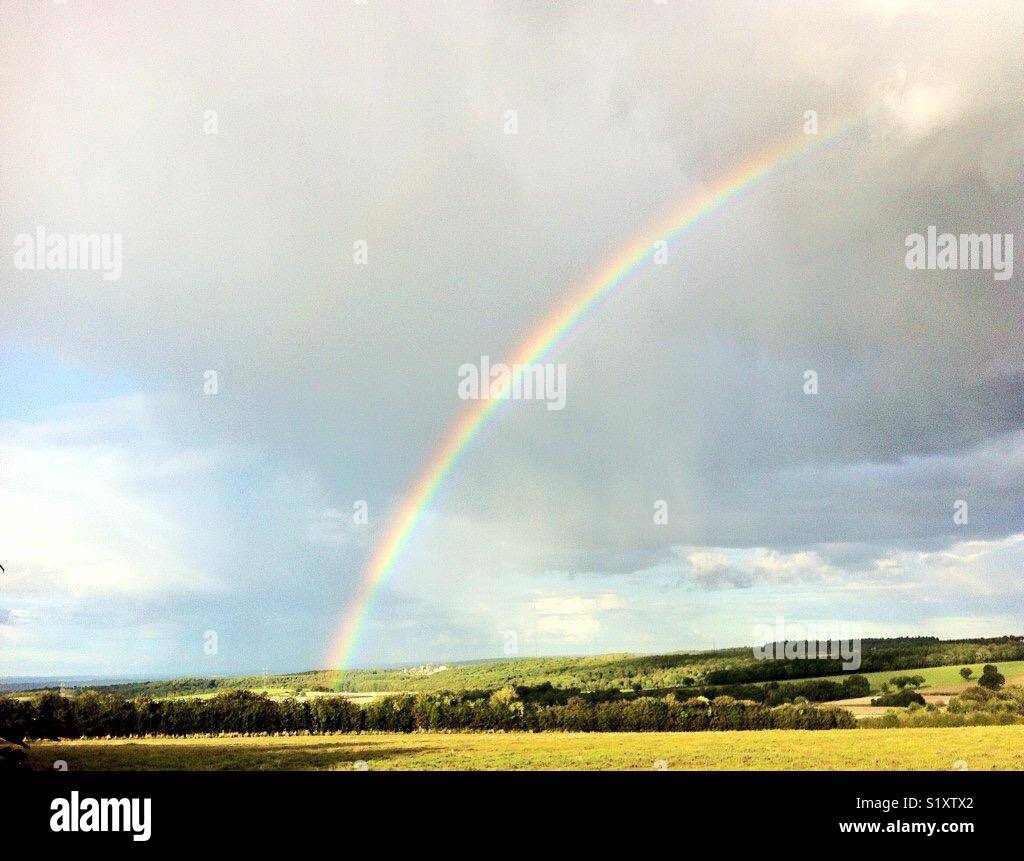 Rainbow over English countryside Stock Photo - Alamy