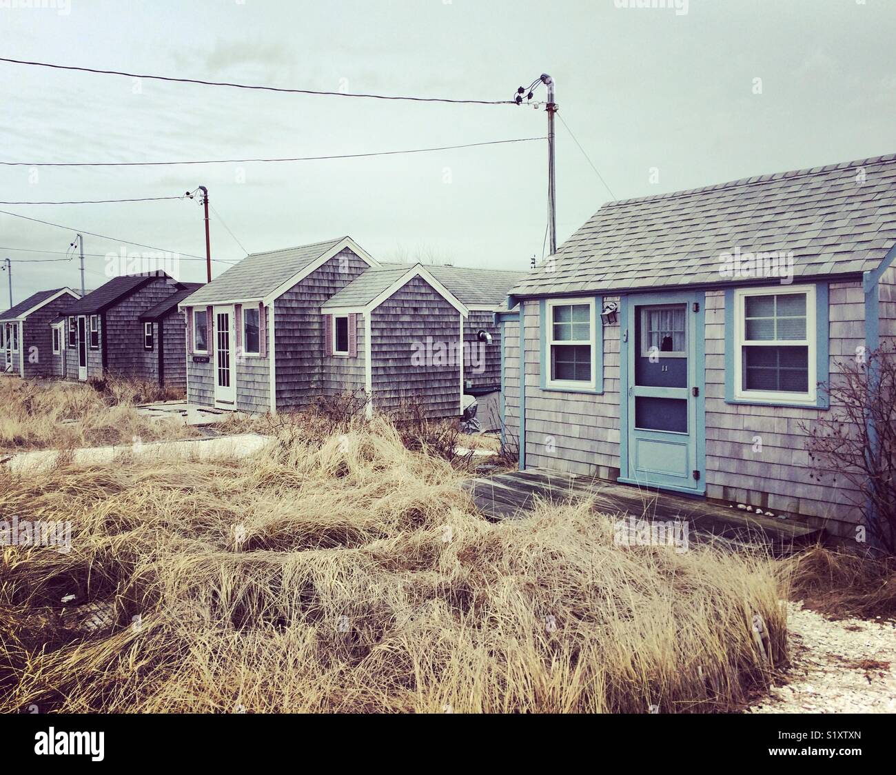 Cottages near the beach on a cloudy winter day, Cape Cod, Massachusetts ...
