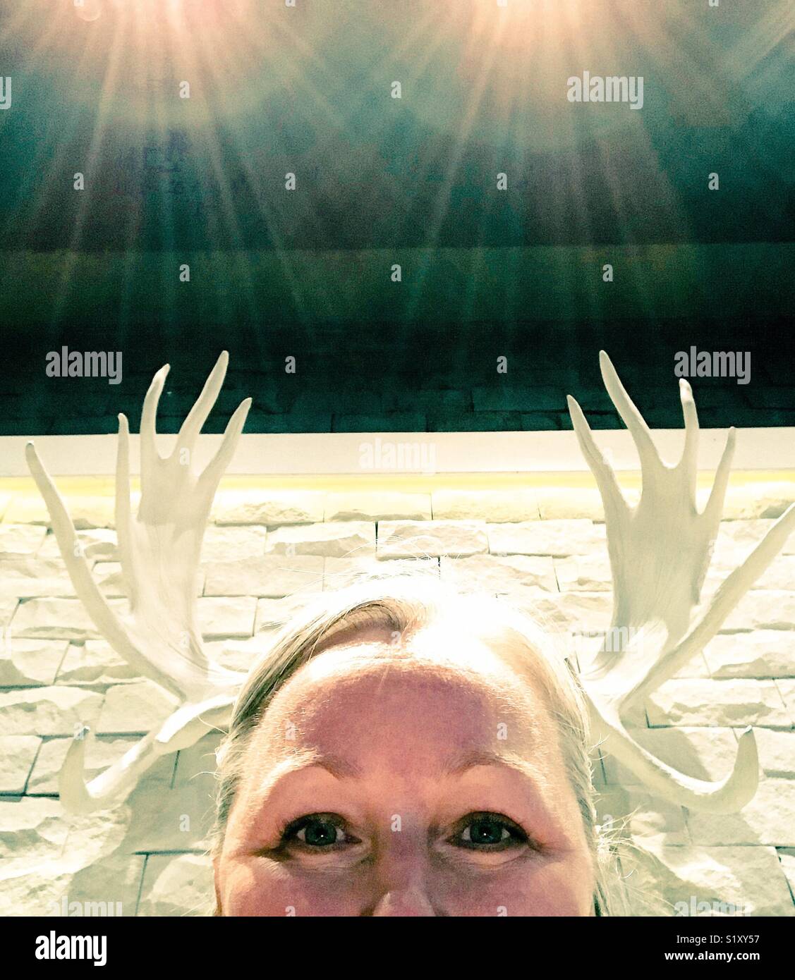 A curious perspective on wall decor creates the illusion of wearing ...