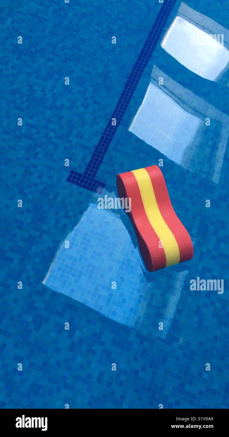 A float in a swimming pool Stock Photo - Alamy