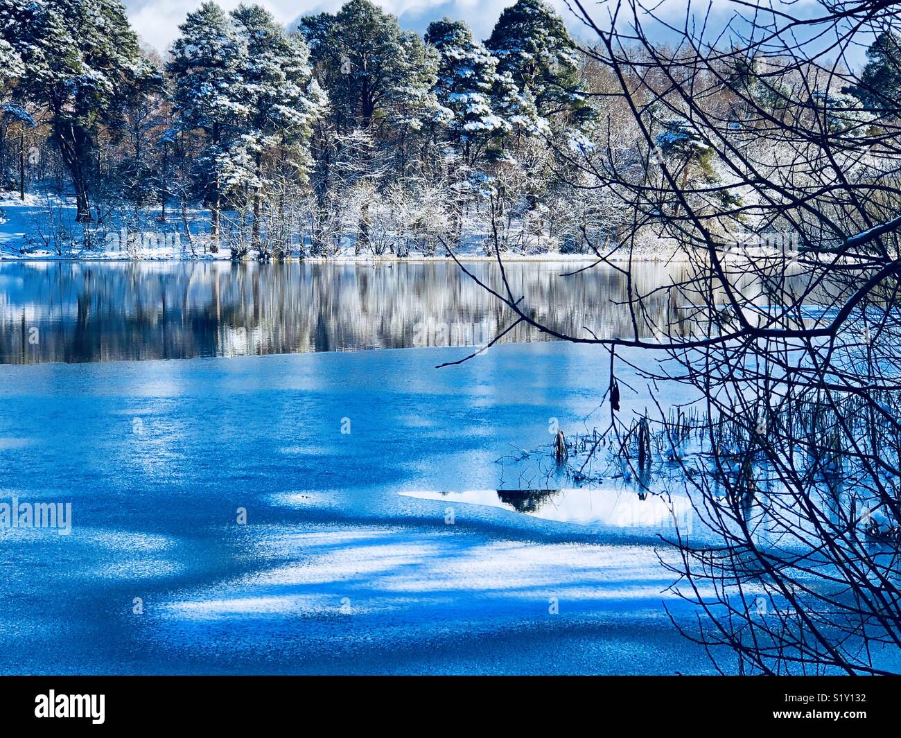 Winter lake snow scene Stock Photo - Alamy