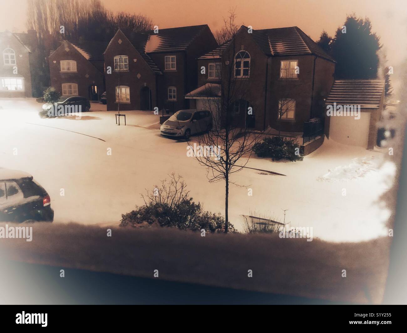 Looking at snow through window hi-res stock photography and images - Alamy