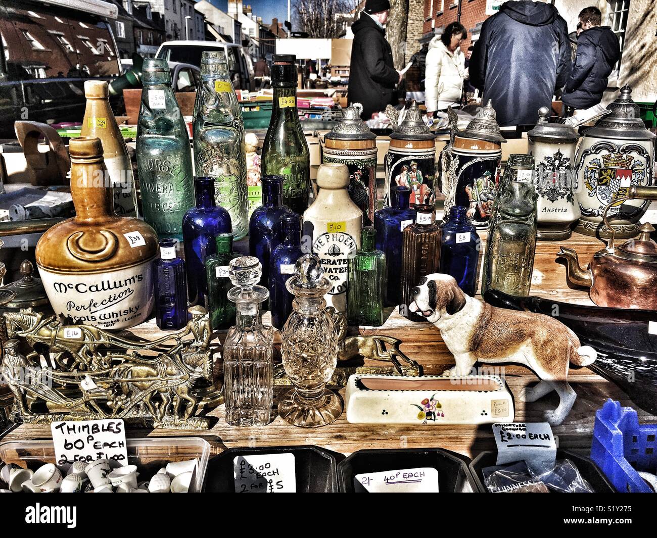 Brick-a-brac for sale at a street market in Bridport, Dorset in England ...