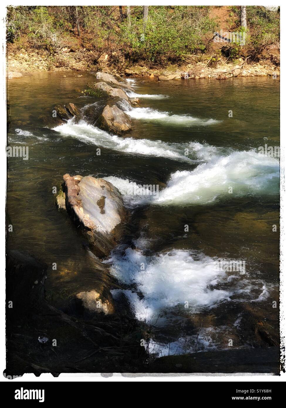 Rushing water over rocks hi-res stock photography and images - Alamy