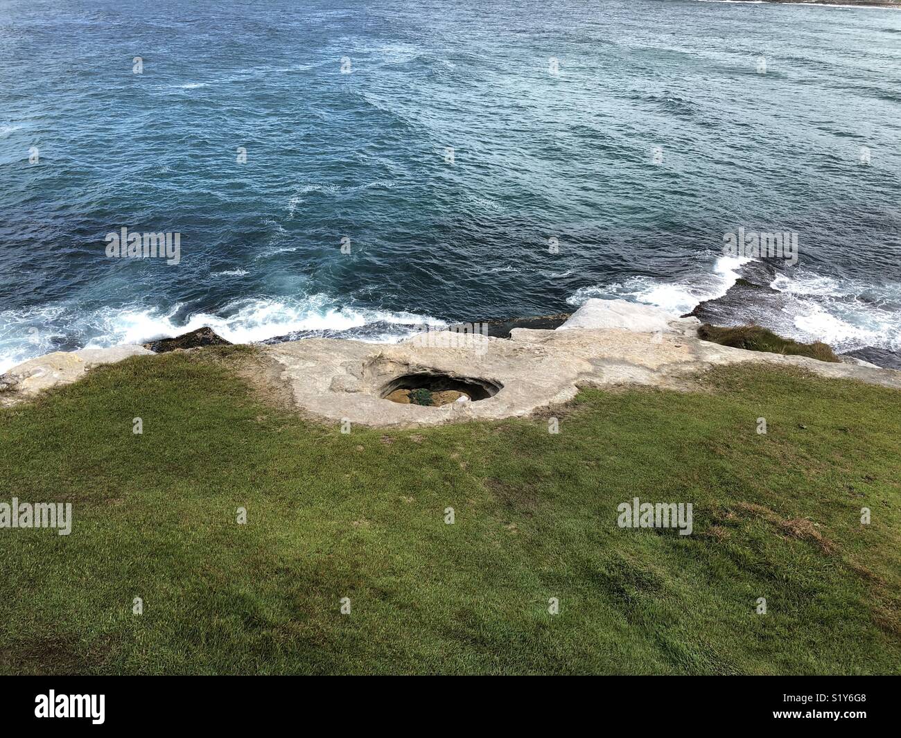 Hole in the cliff hi-res stock photography and images - Alamy