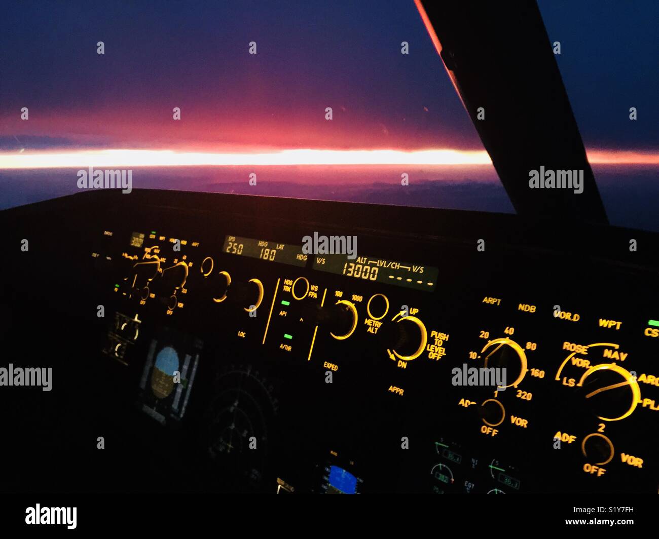 Sunrise from cockpit Stock Photo - Alamy