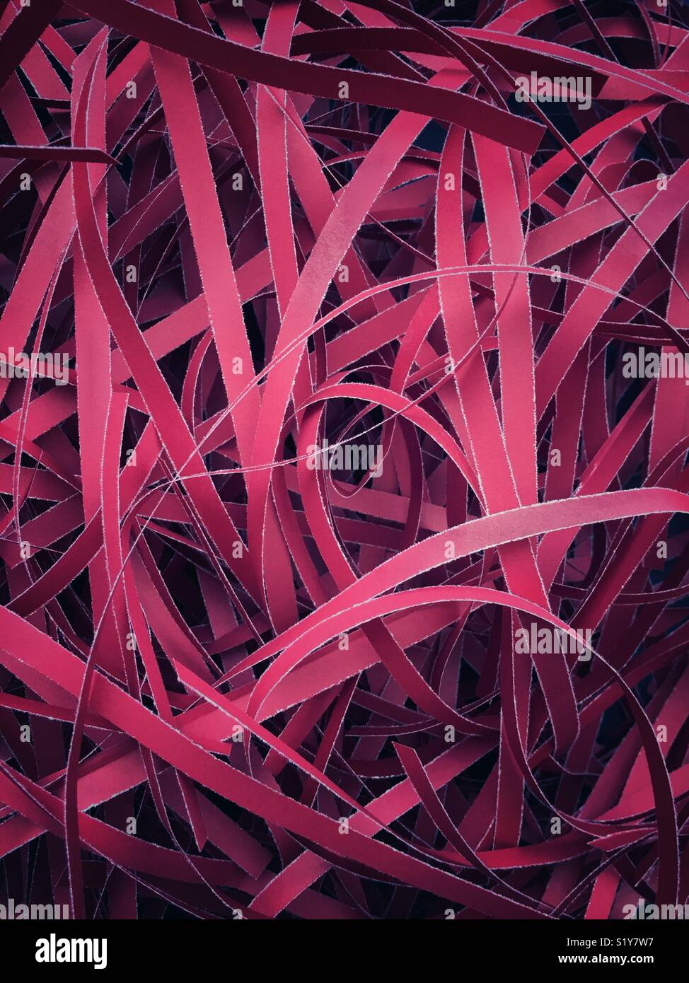 Shredded red paper abstract background Stock Photo - Alamy