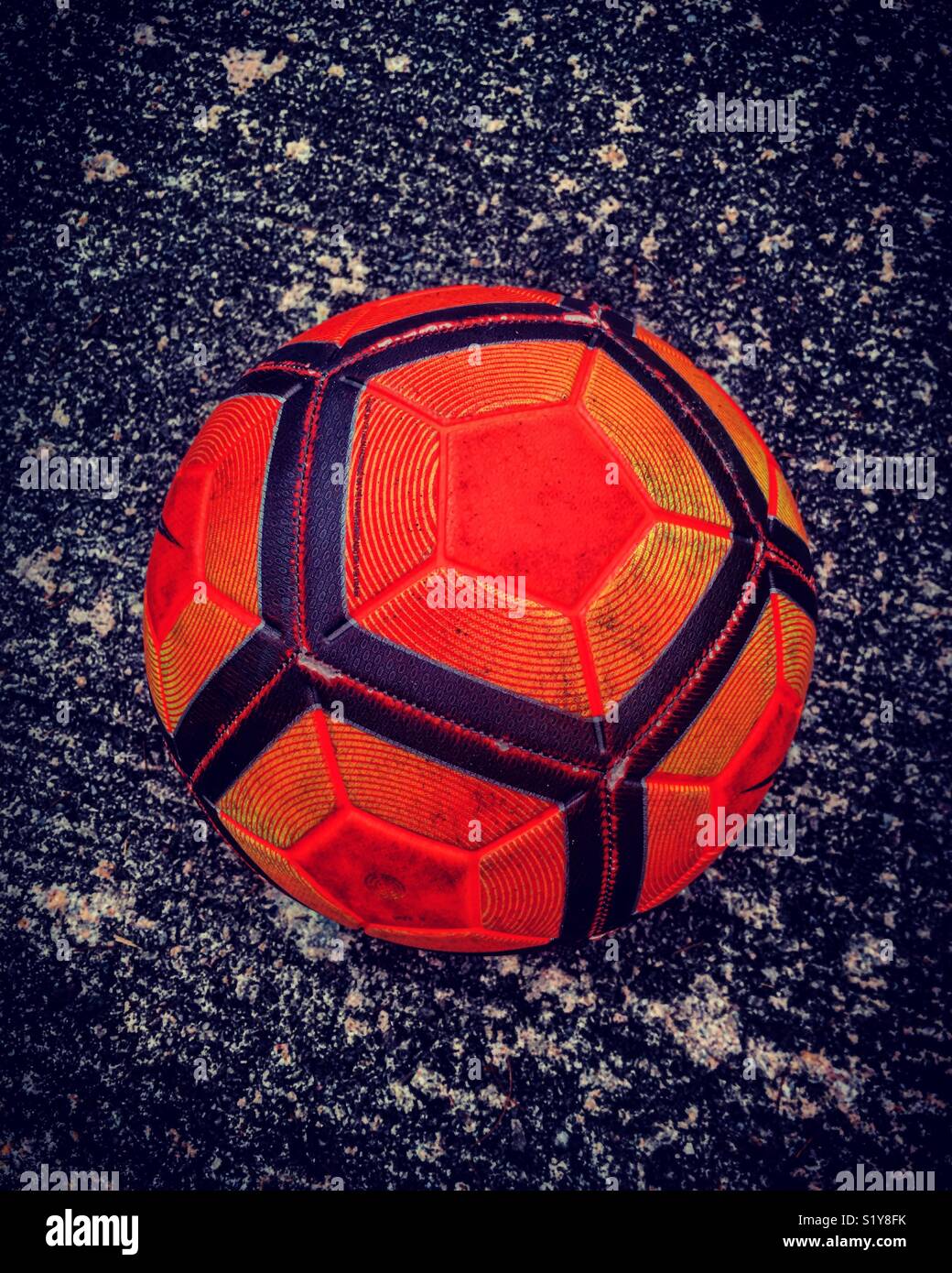 Orange football ball Stock Photo - Alamy