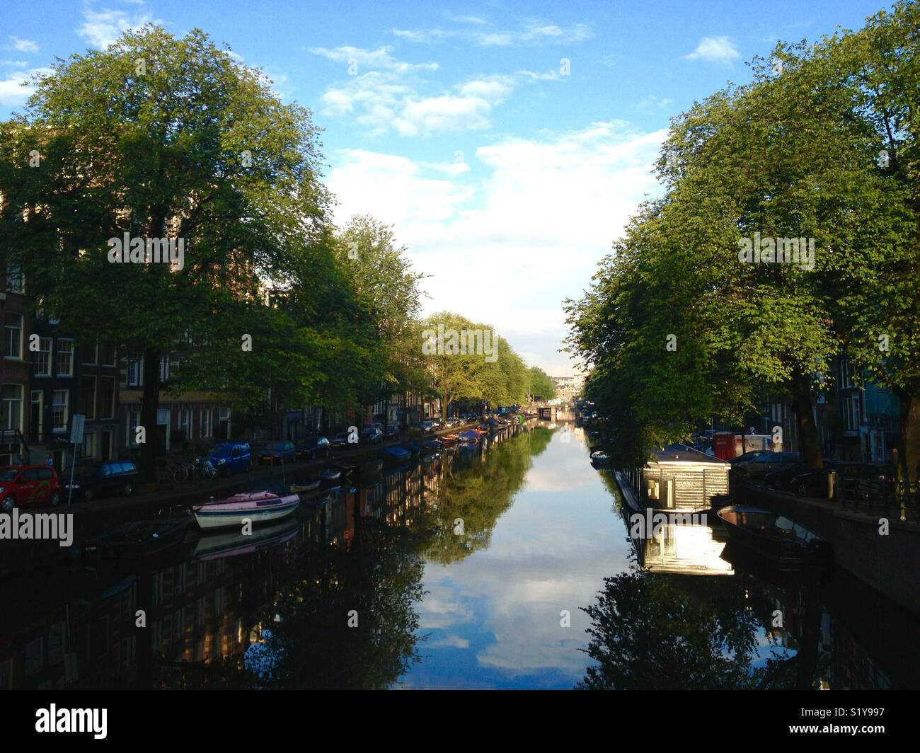 Amsterdam canal during beautiful spring morning Stock Photo - Alamy