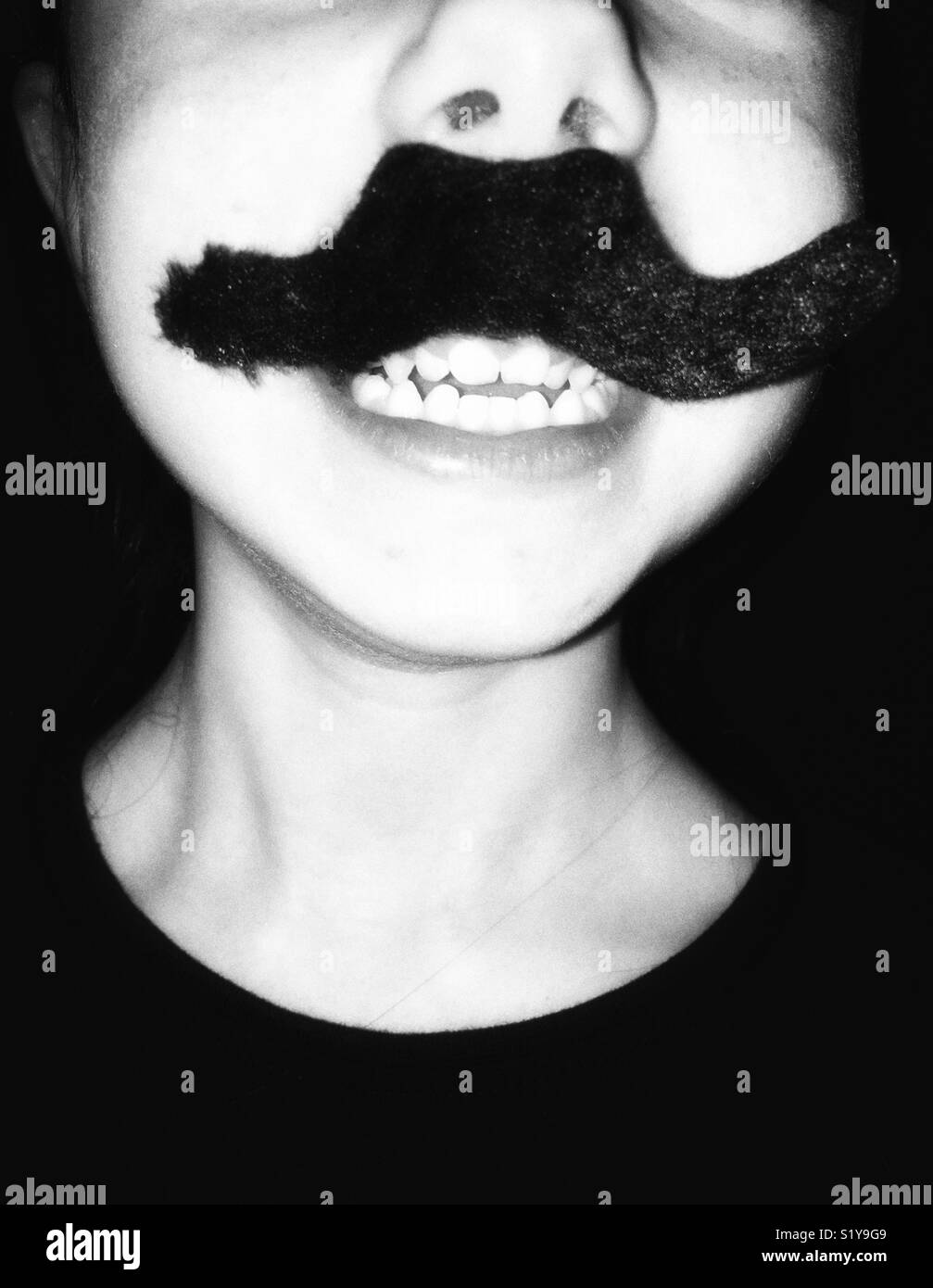Child with fake moustache hi-res stock photography and images - Alamy
