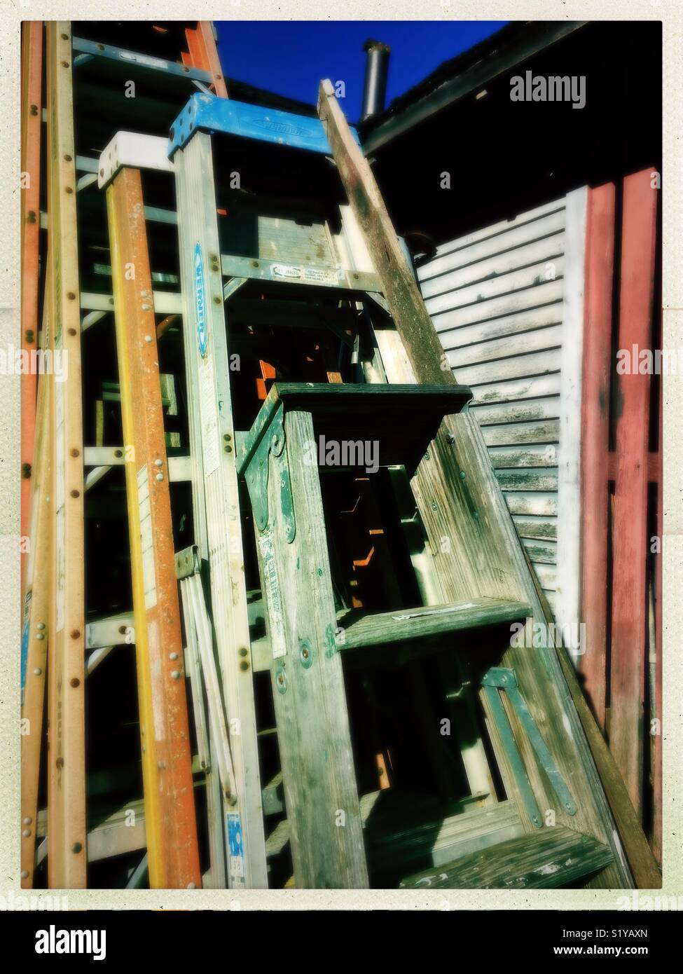 Leaning ladders hi-res stock photography and images - Alamy