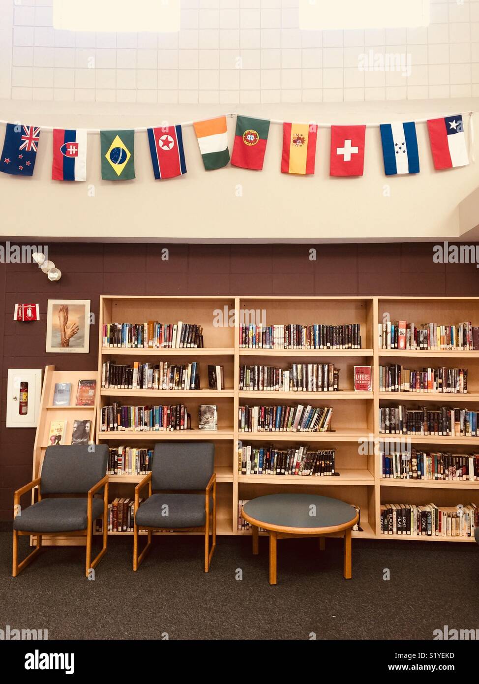 Modern library with international flags Stock Photo - Alamy
