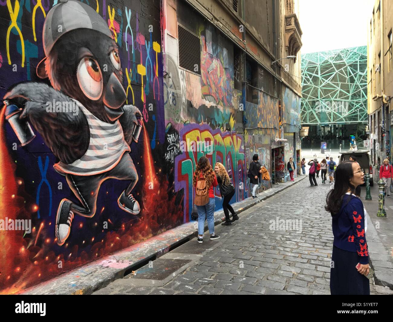 Hosier Lane in Melbourne with Federation Square in background with ...