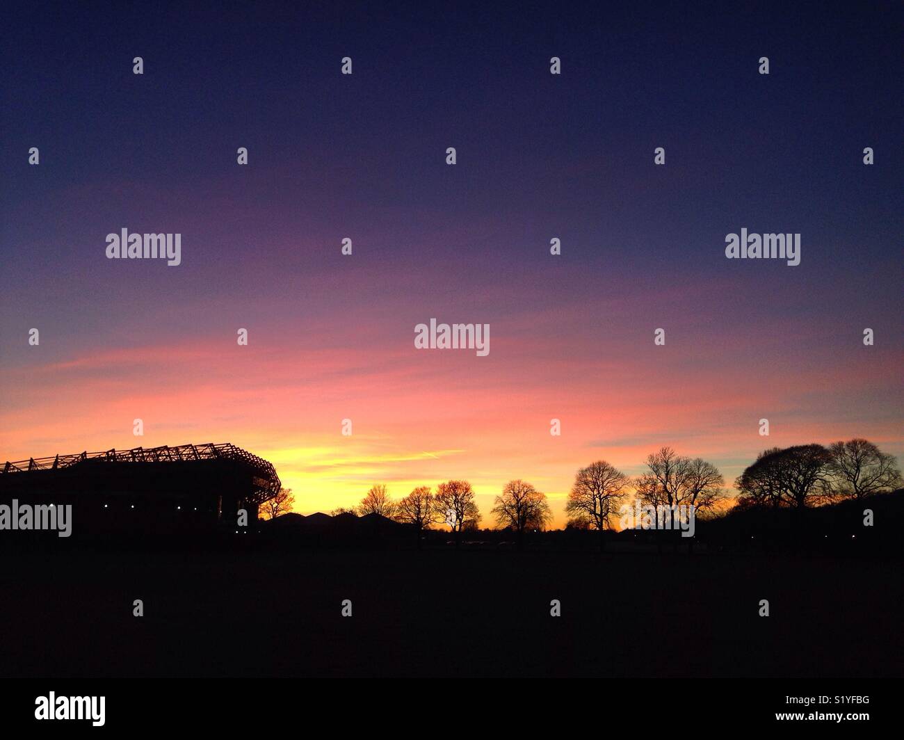 Sunburst over Roseburn Park, Edinburgh Stock Photo - Alamy
