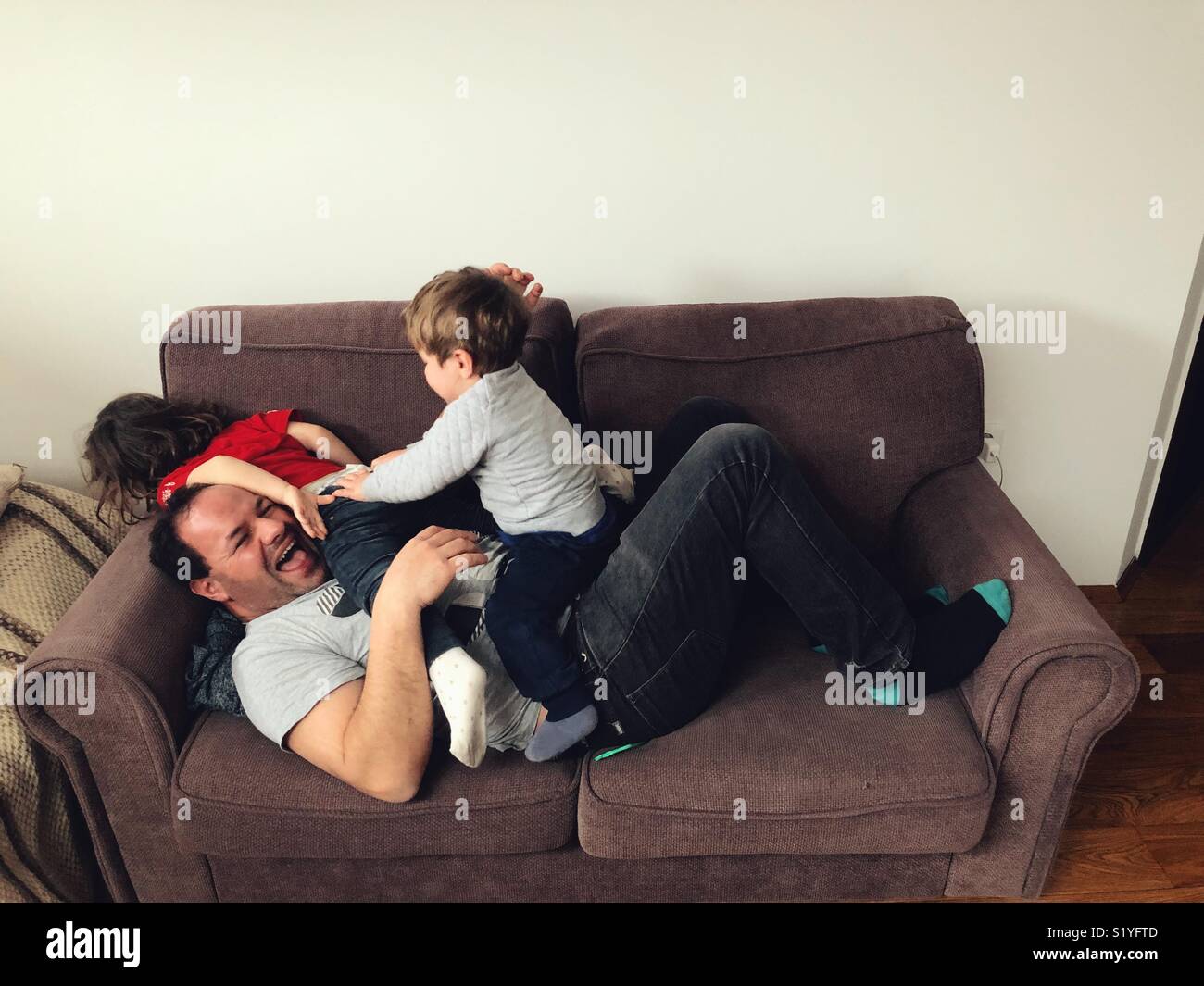 Family having fun real hi-res stock photography and images - Alamy