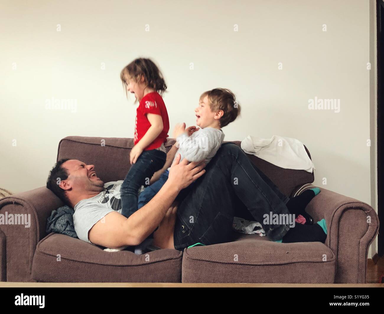 Family fun at home Stock Photo - Alamy