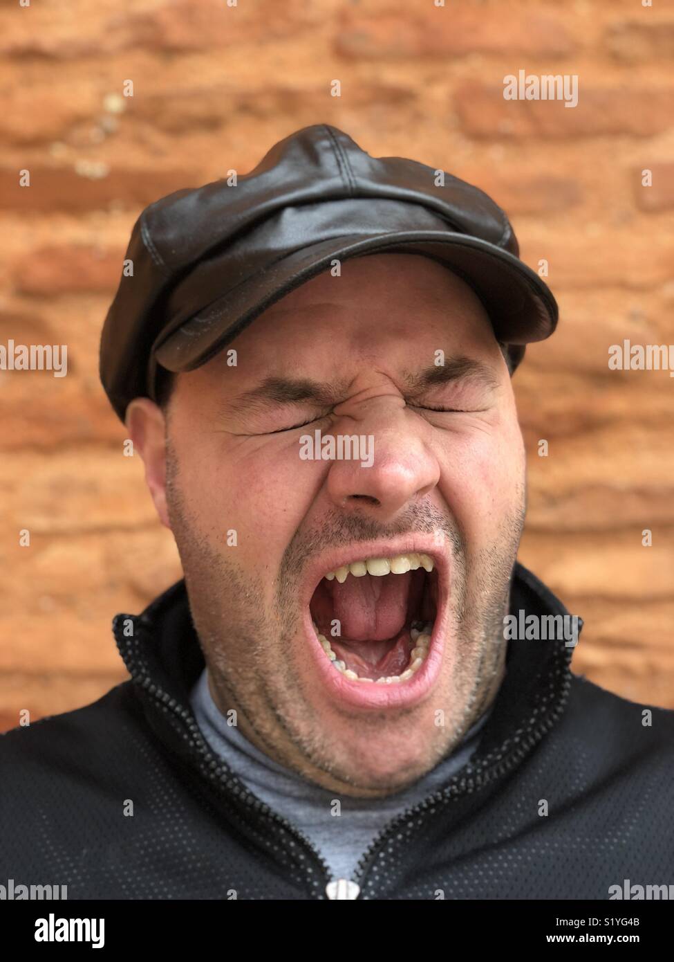 Man yawn hi-res stock photography and images - Alamy