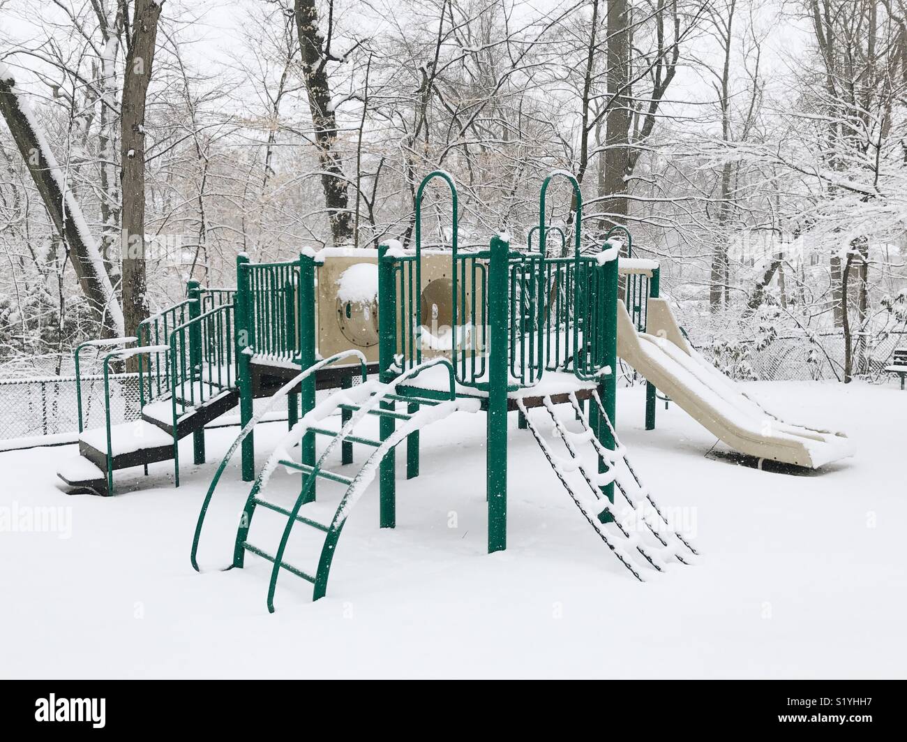 Playground covered snow smartphone stock photos and images - Alamy