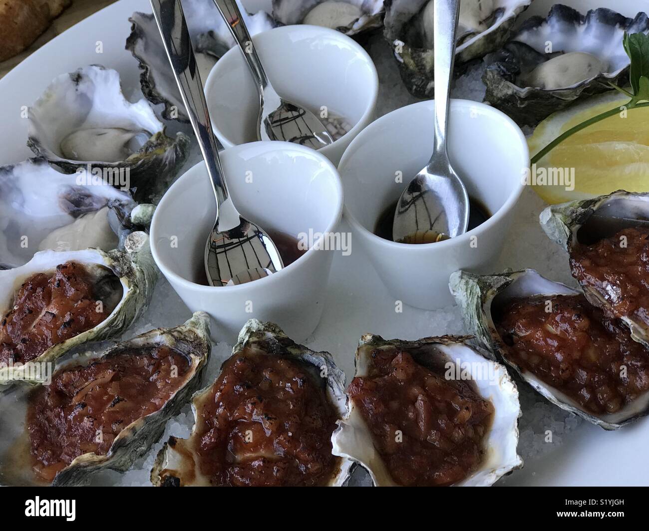 Oysters in shells hi-res stock photography and images - Alamy