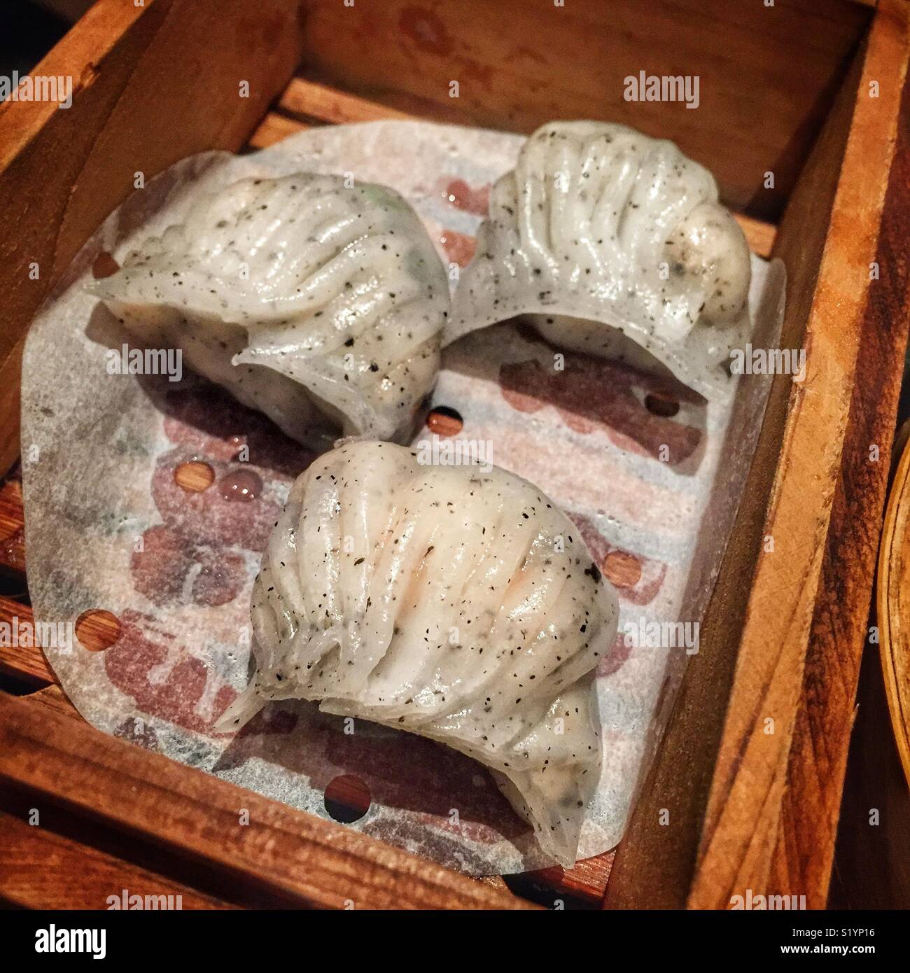 Black truffle har gau shrimp dumplings (黑松露蝦餃), a dish at Dim Sum ...