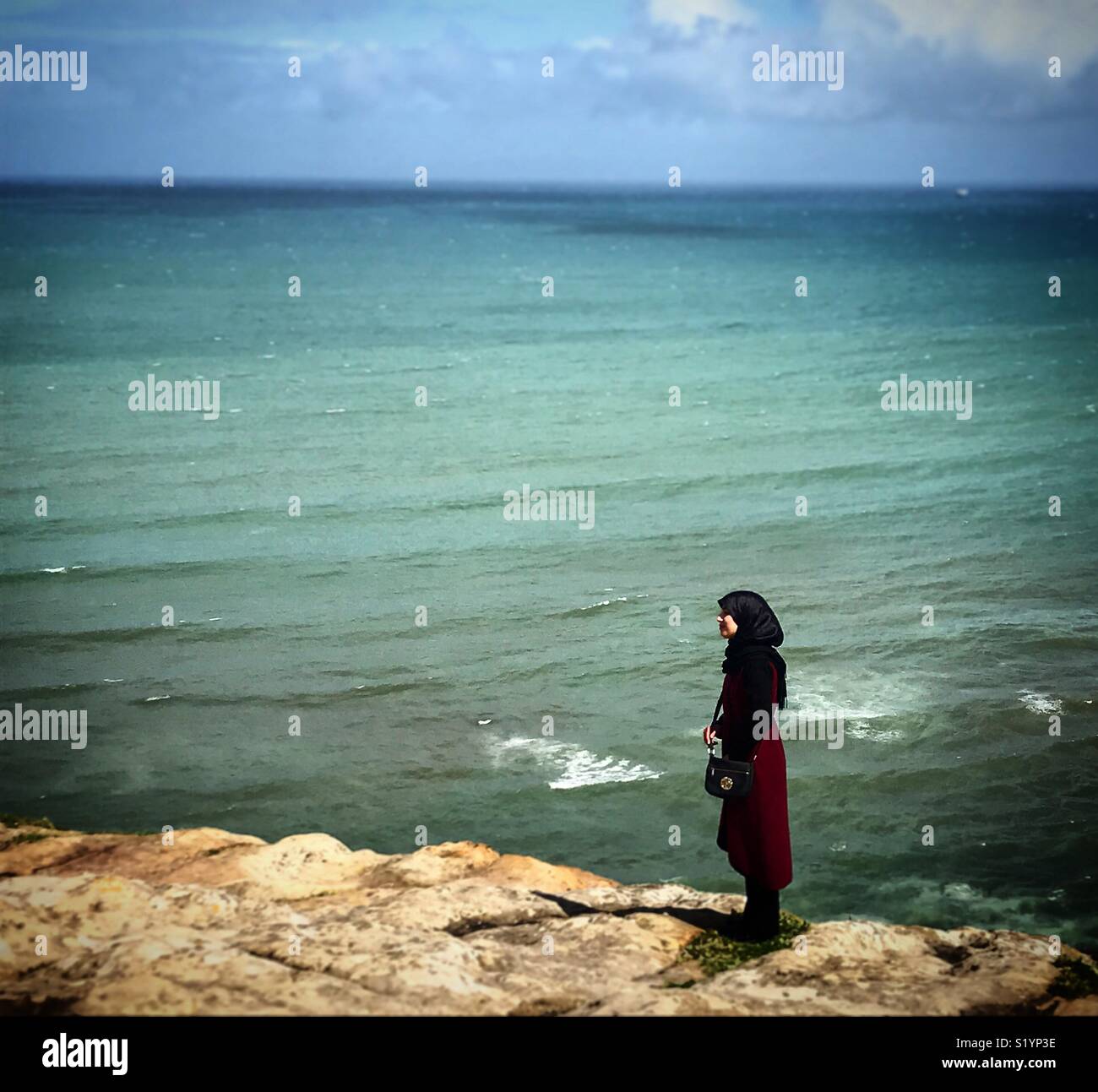 A young woman poses for a picture in Tangier, Morroco, Africa Stock ...