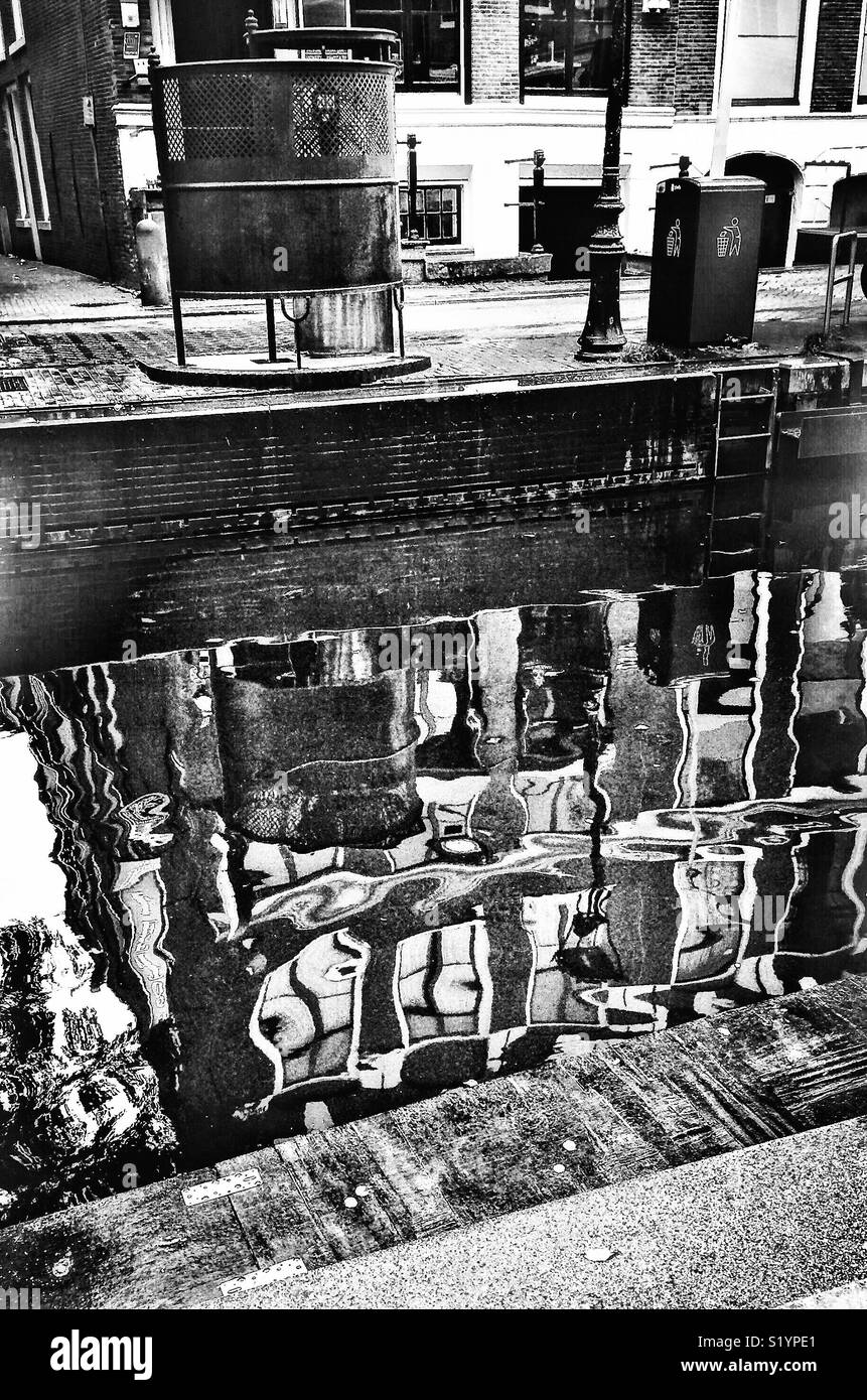 Black and white image of traditional urinal pissoir with architecture ...