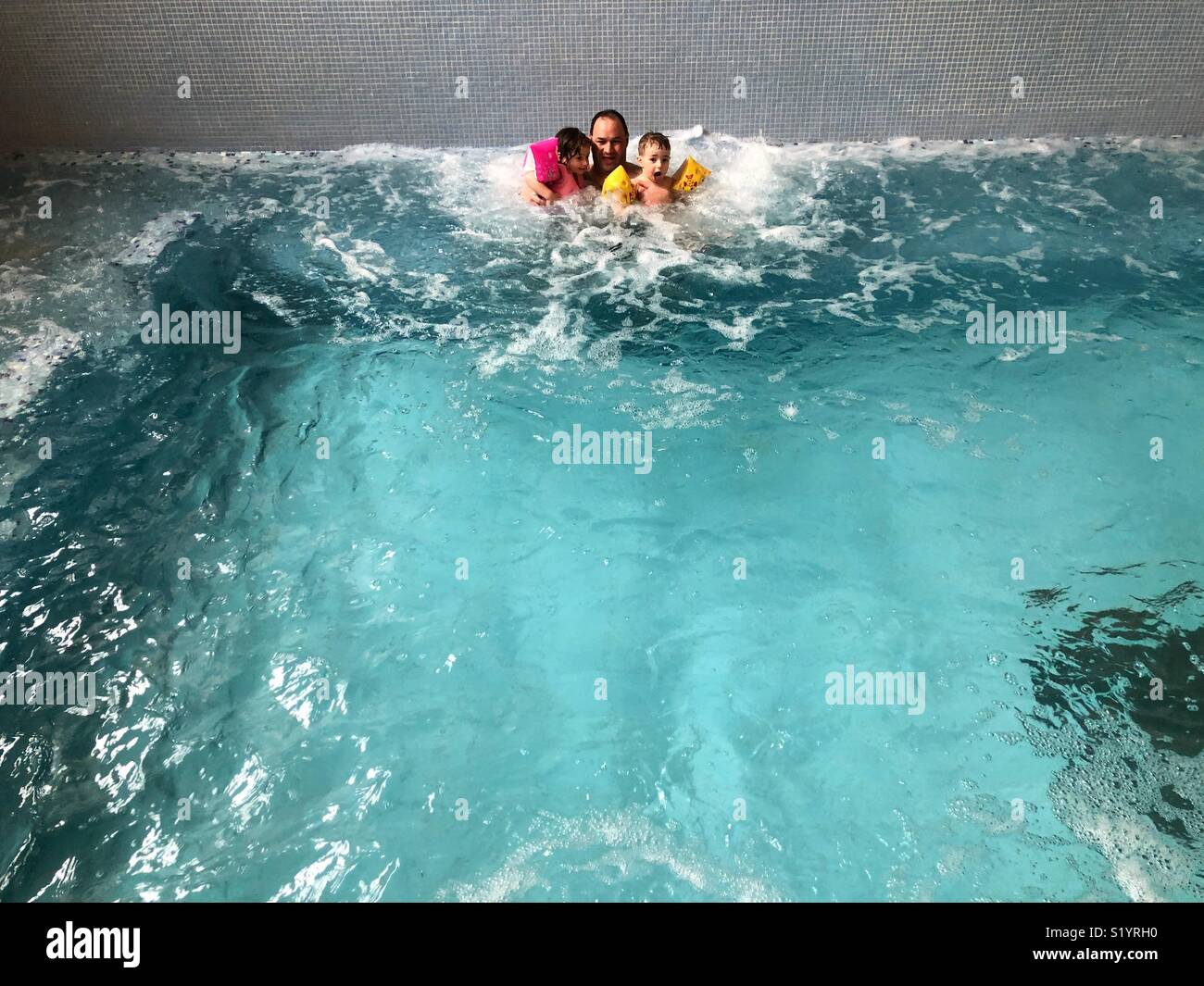 Family swimming pool hi-res stock photography and images - Alamy