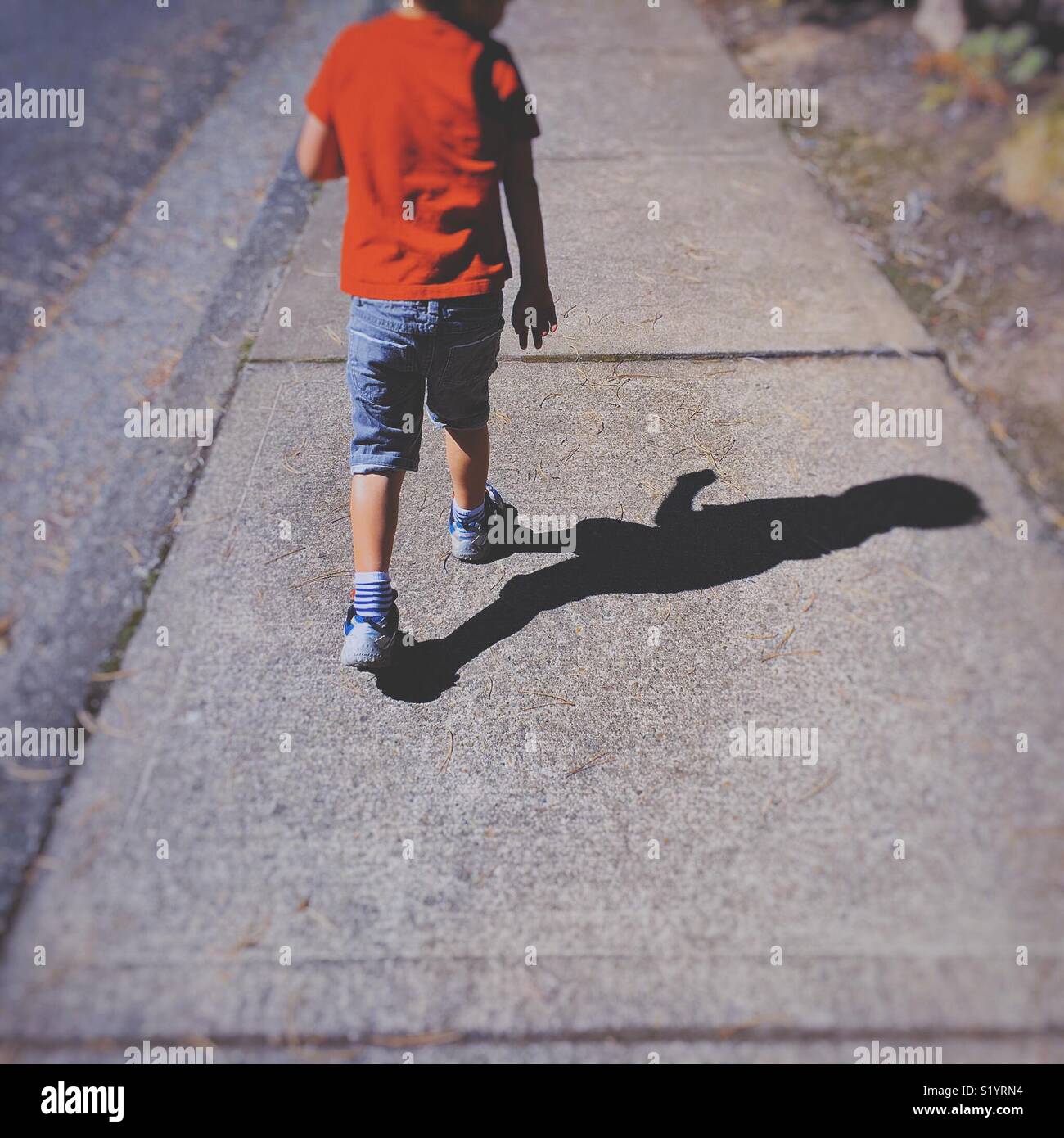 Boy and shadow hi-res stock photography and images - Alamy
