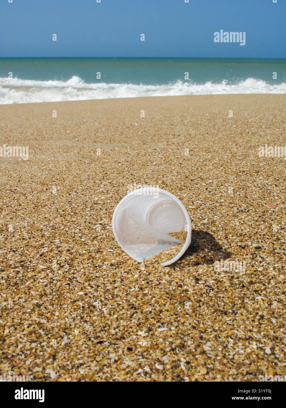 Plastic cup in the sand hi-res stock photography and images - Alamy