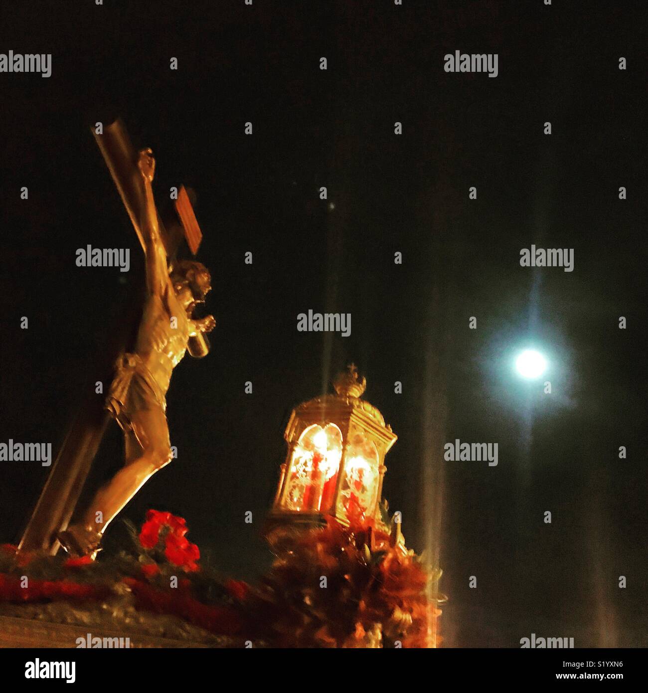 An image of Jesus Christ crucified and the full moon during Easter Holy ...
