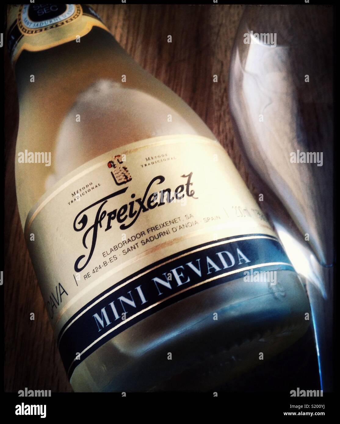 A mini (200ml) bottle of Freixenet Cava with flute glass Stock Photo ...