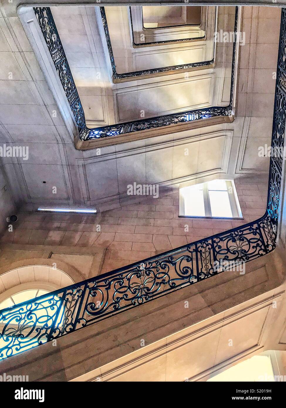 Looking up a staircase Stock Photo - Alamy