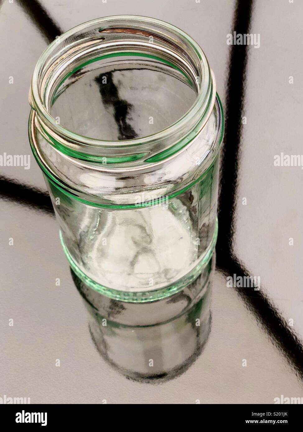 Reflections of a glass jam jar Stock Photo - Alamy
