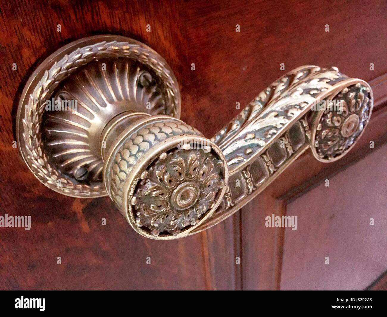 Ornate door handle hi-res stock photography and images - Alamy