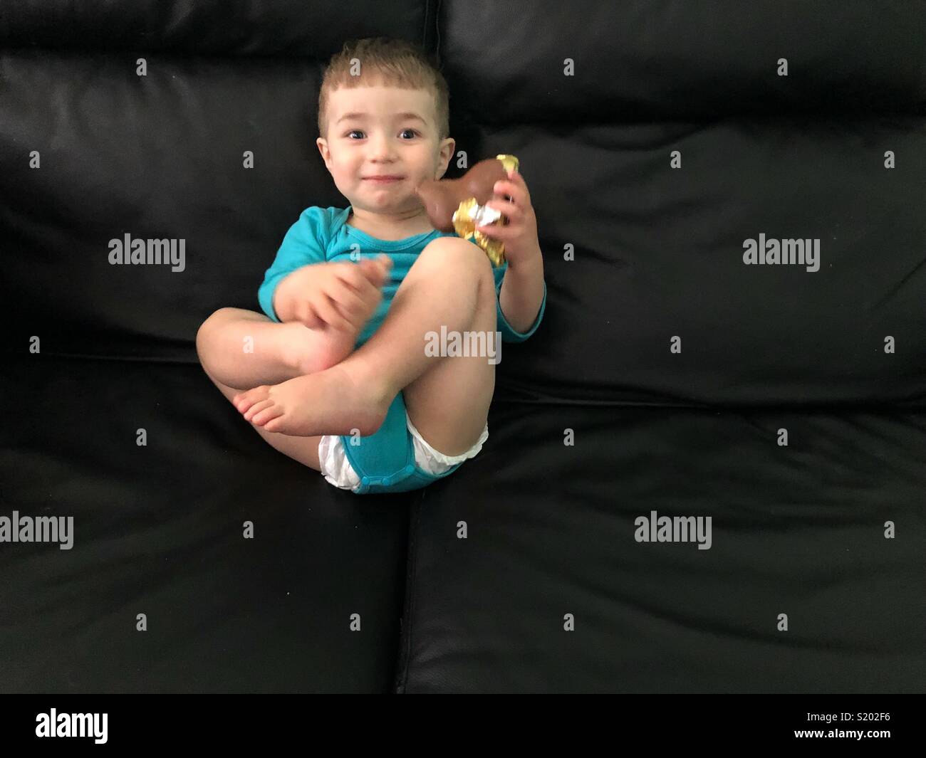 Children eating chocolate during Easter Stock Photo - Alamy