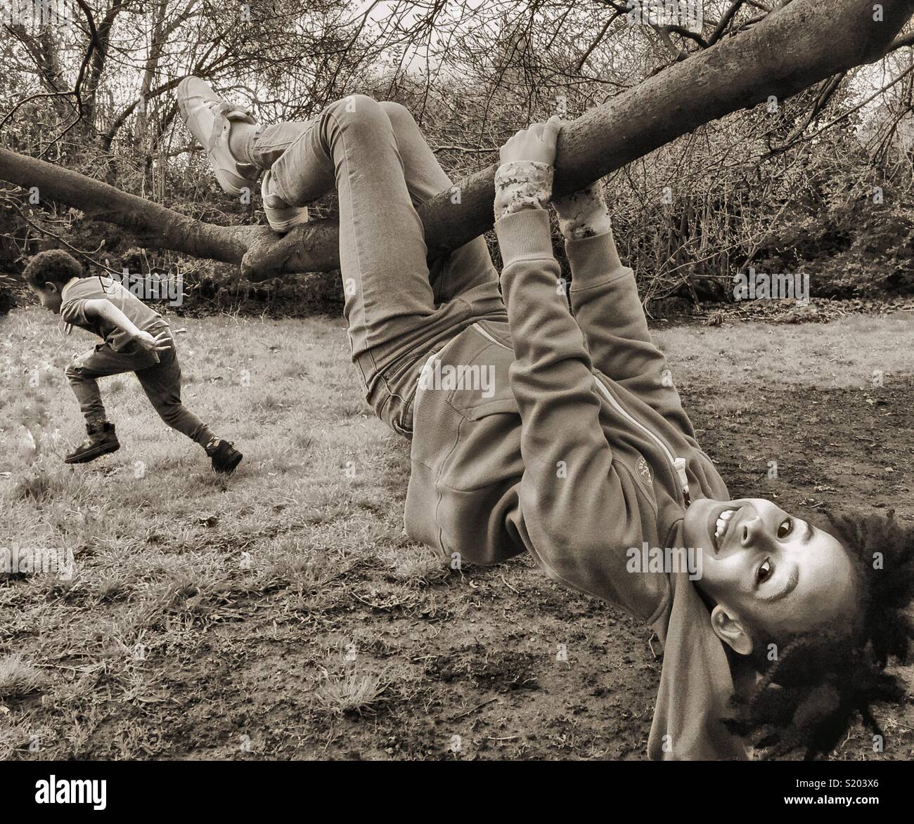 Children playing outside Stock Photo - Alamy