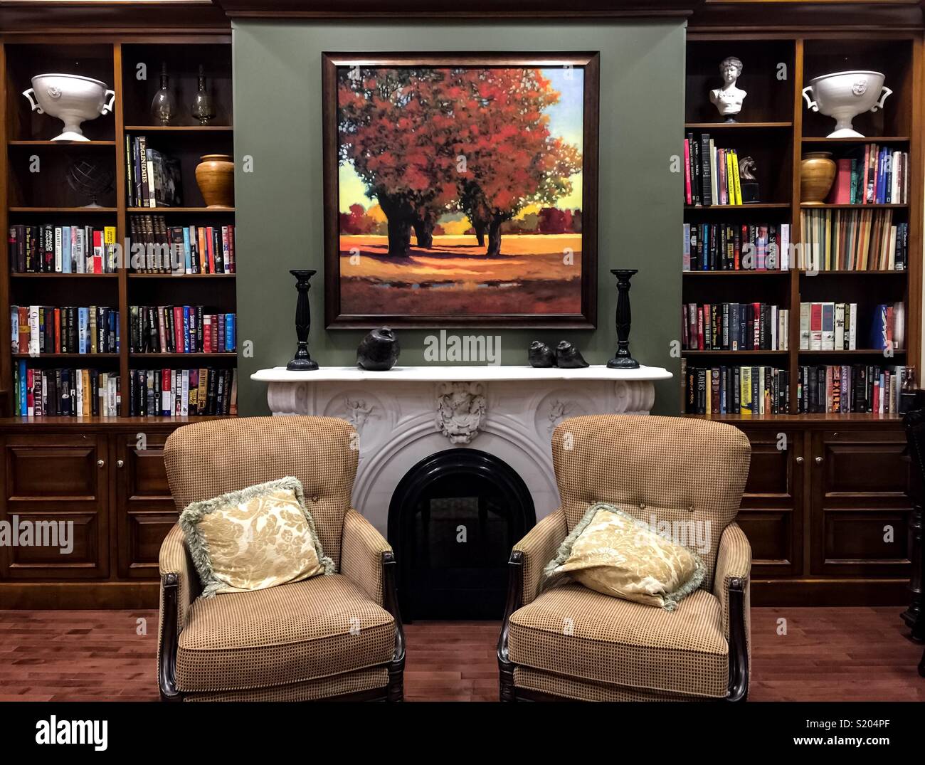 Elegant sitting room and library in classic style Stock Photo - Alamy