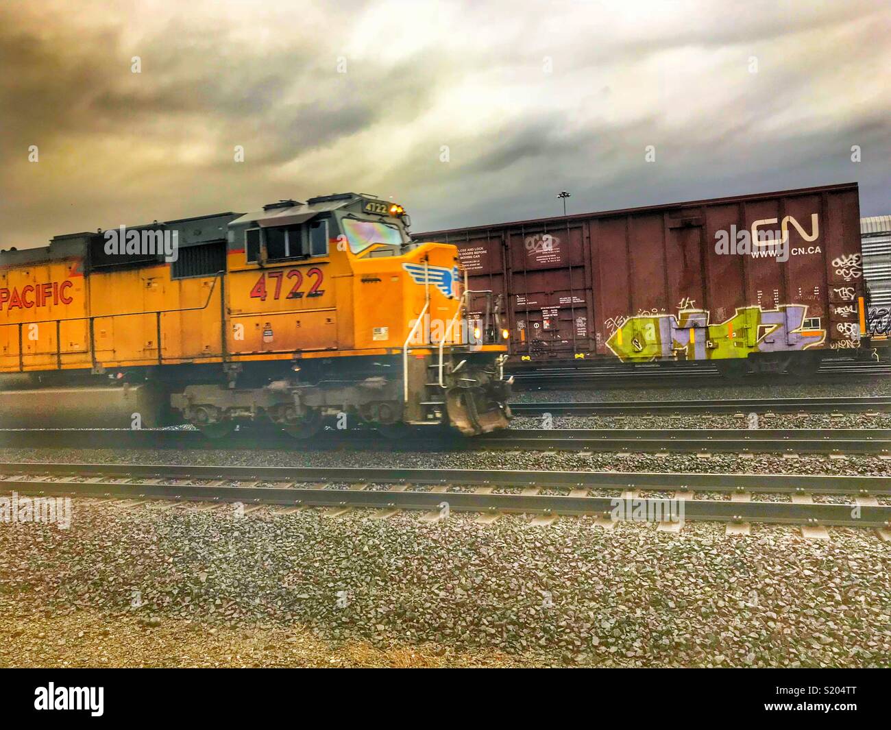 Train engine and train car on the track in Portland Oregon Stock Photo ...