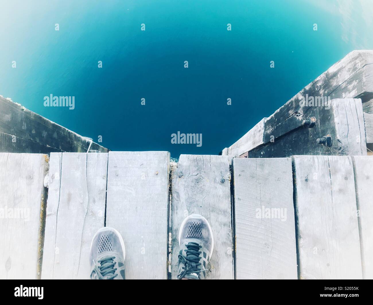 Stepping close to the edge Stock Photo - Alamy