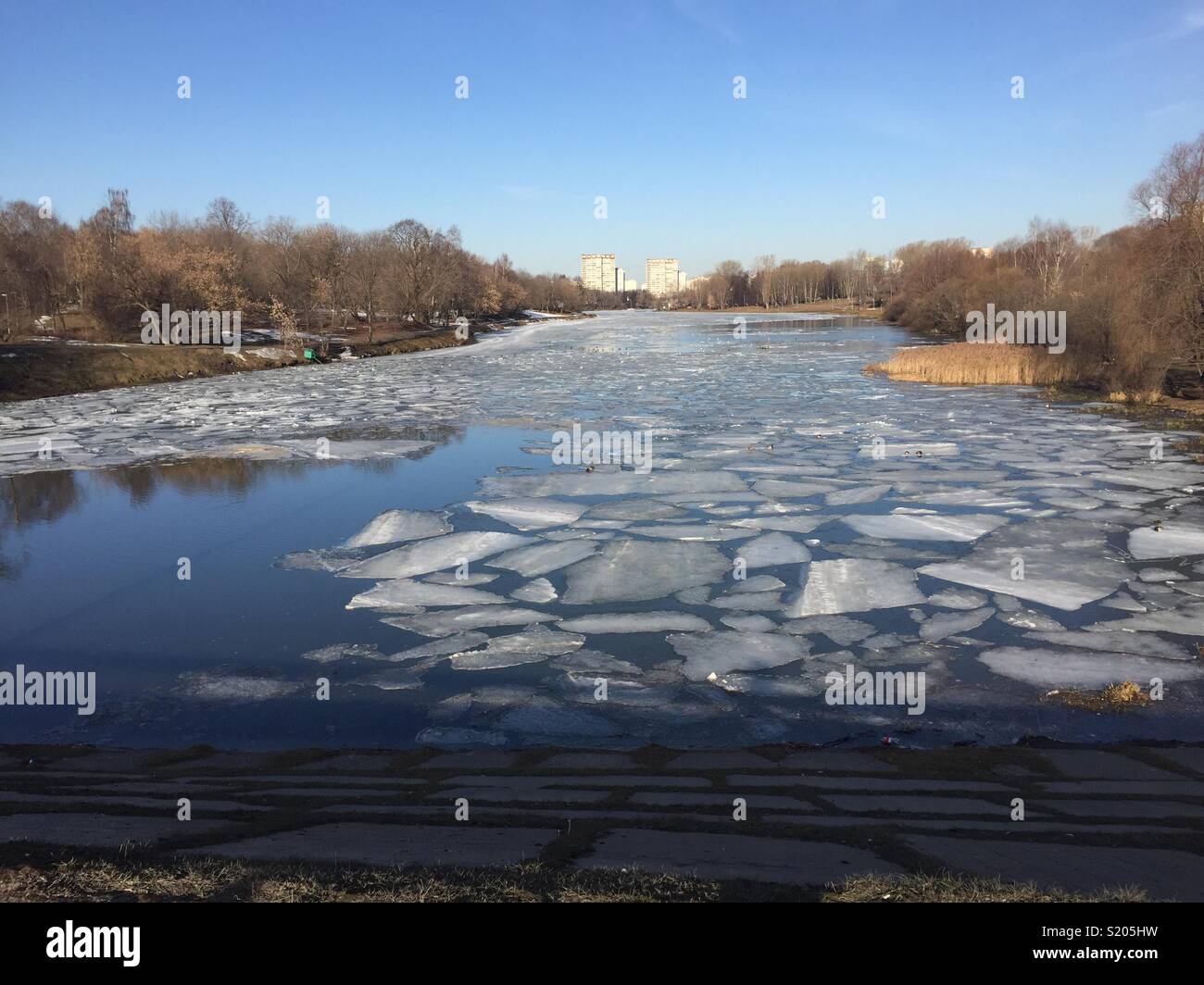 spring melting ice on the lake Stock Photo - Alamy