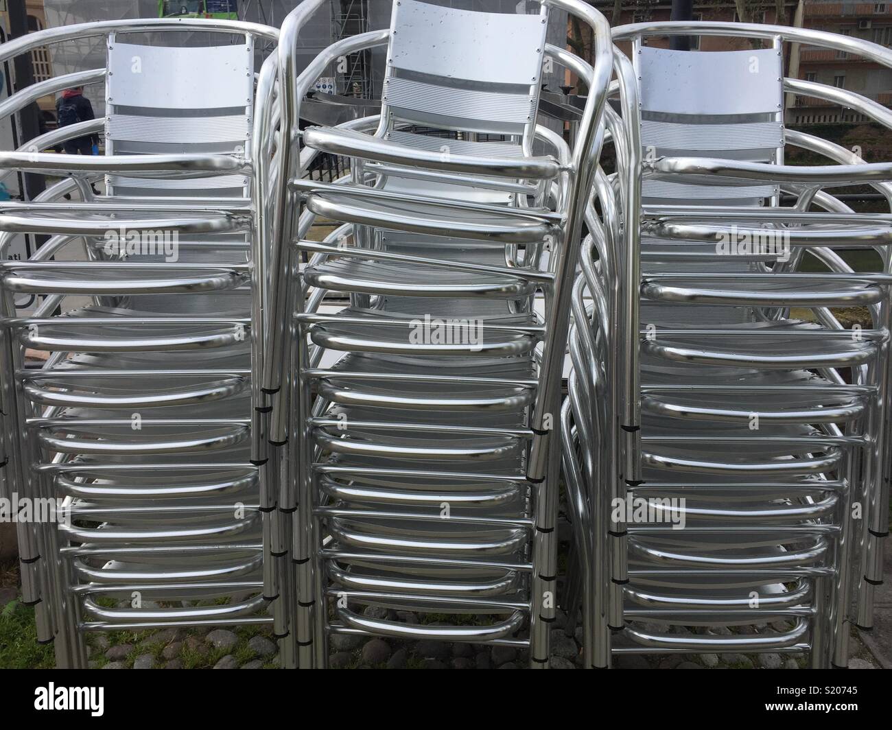 Metallic chairs tiles Stock Photo - Alamy