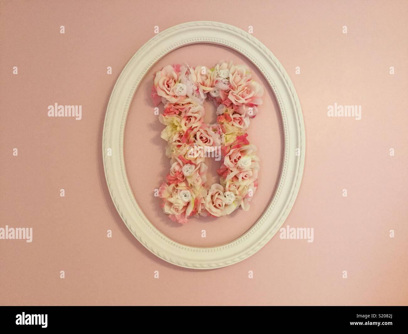 Pink flower letter B Stock Photo - Alamy