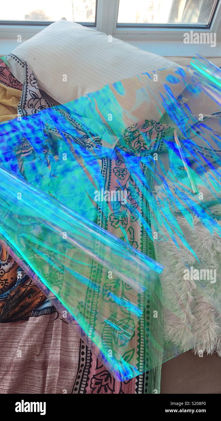 iridescent fabric material on various textures Stock Photo - Alamy