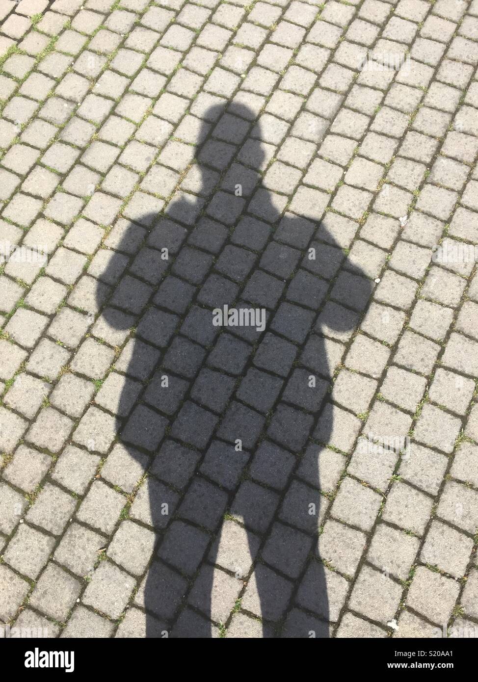 Human shadow on patterned floor Stock Photo - Alamy