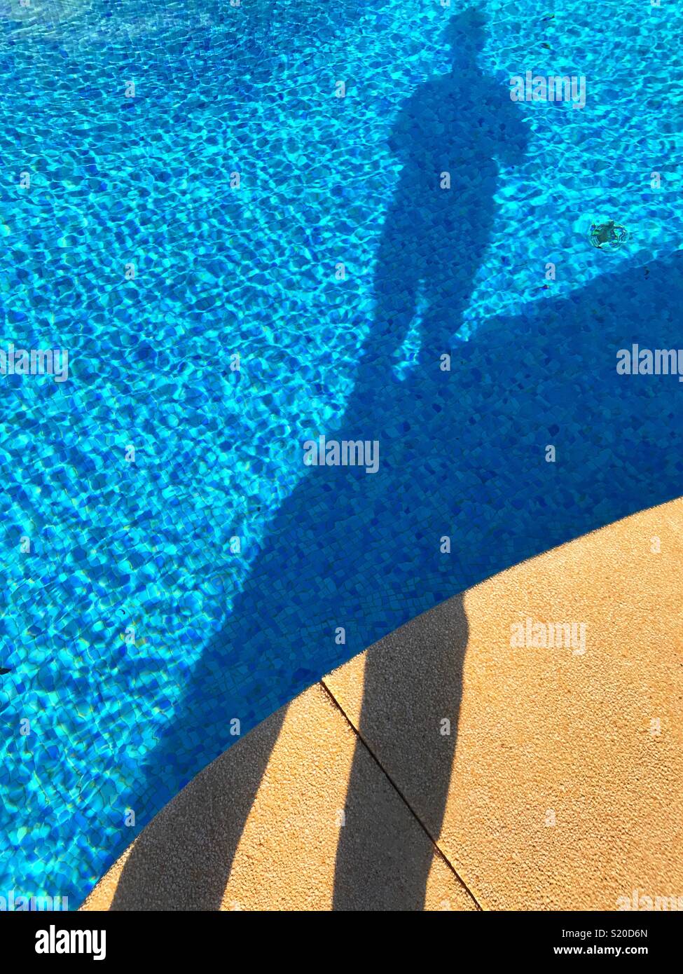 Selfie shadow standing at poolside Stock Photo - Alamy