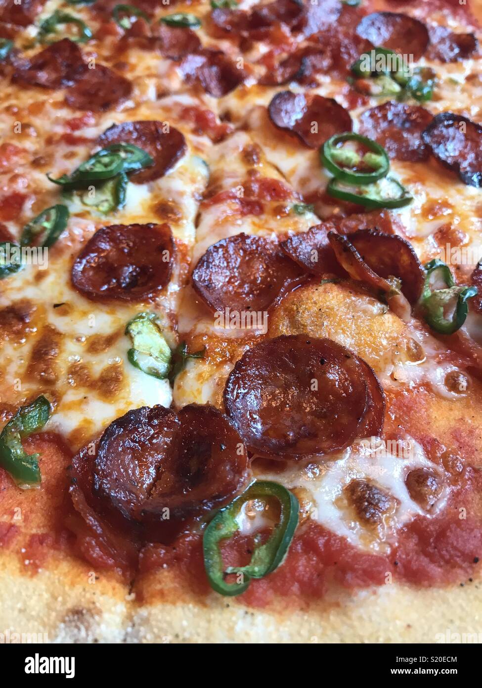 A pepperoni and chilli pizza Stock Photo - Alamy
