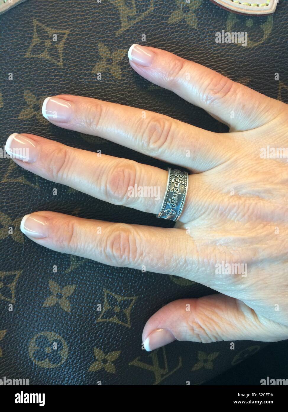 Right hand with french manicure Stock Photo - Alamy